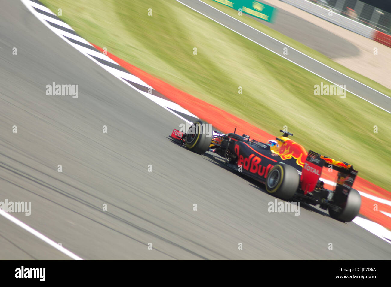 Red Bull at the the first corner of the Silverstone Grand Prix circuit ...