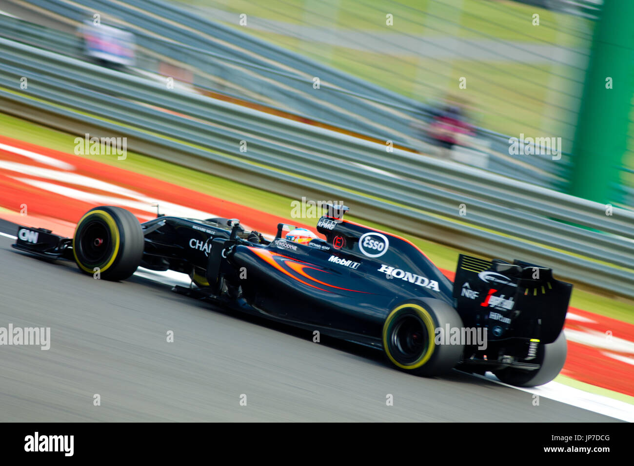 at the the first corner of the Silverstone Grand Prix circuit during ...