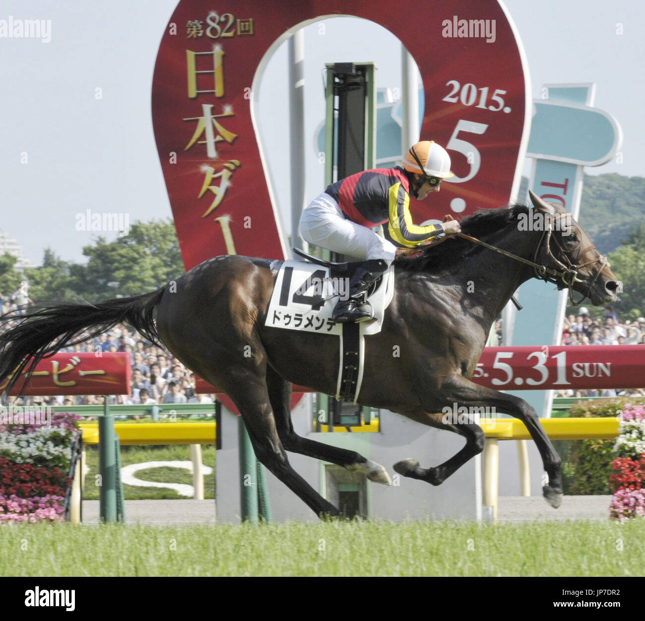 Duramente, jockeyed by Italian Mirco Demuro, crosses the finish line to ...