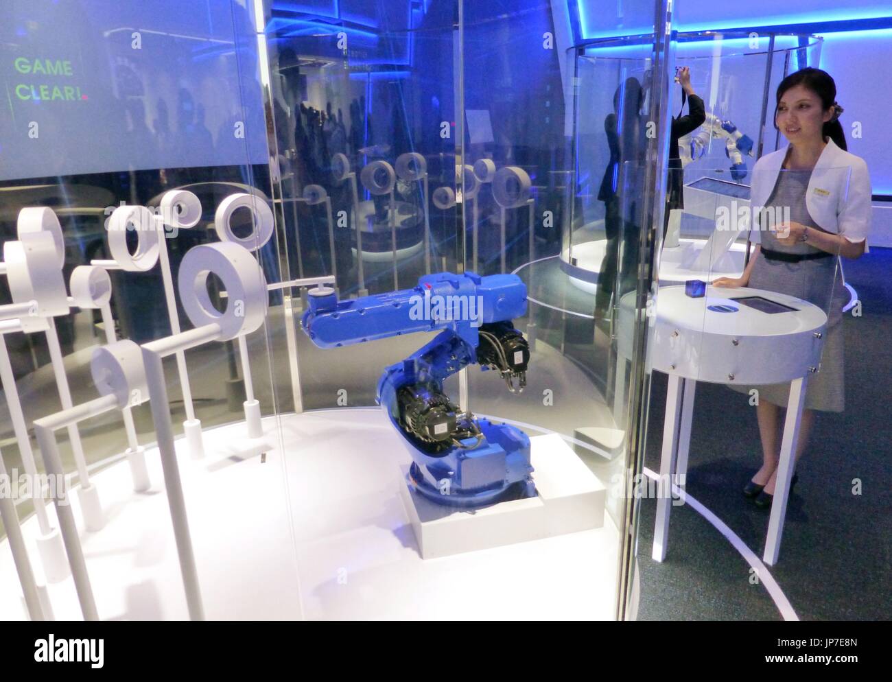 Photo taken June 1, 2015, shows a robot arm on display at a "robot ...