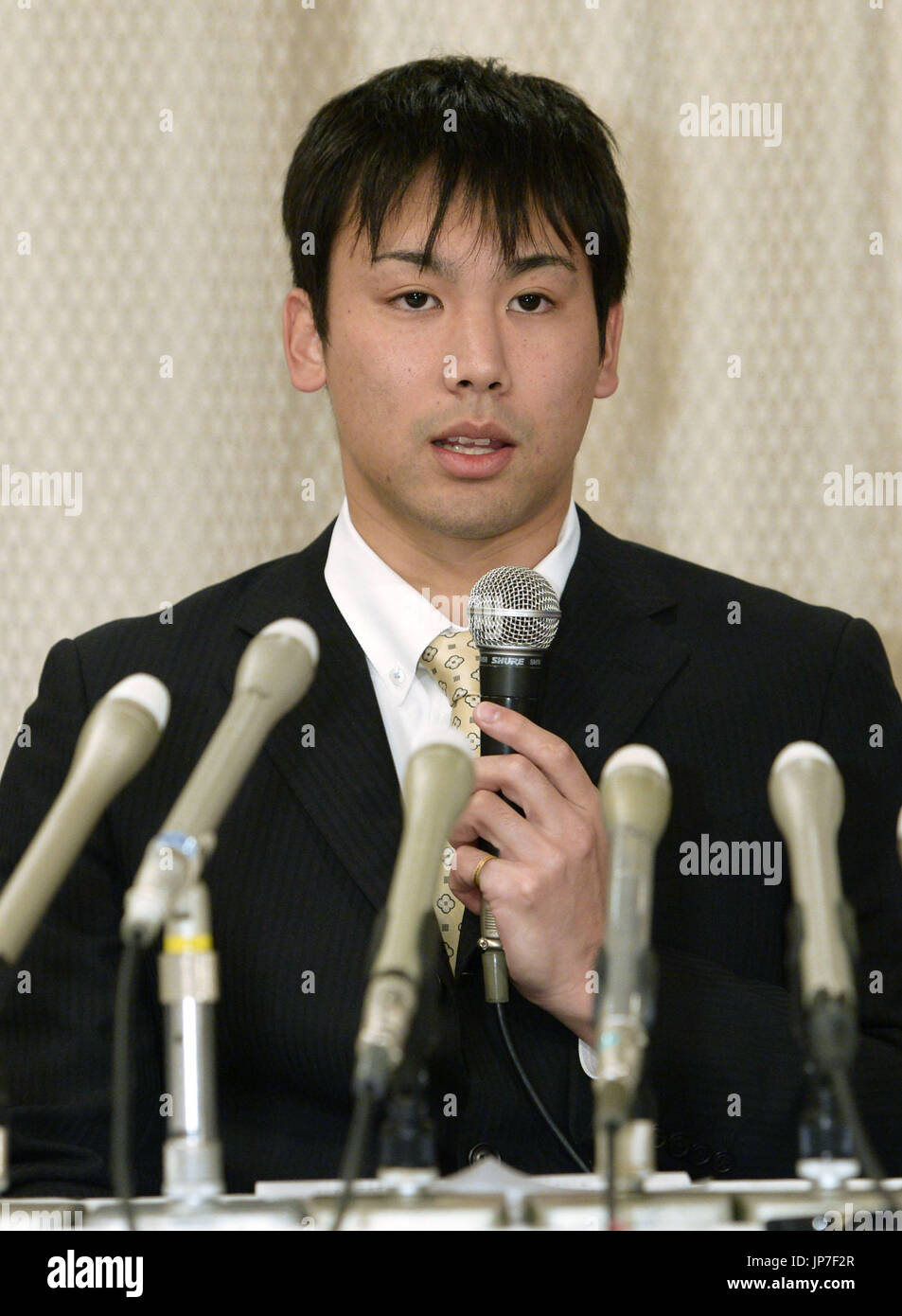 Japanese swimmer Naoya Tomita attends a press conference in Nagoya on ...
