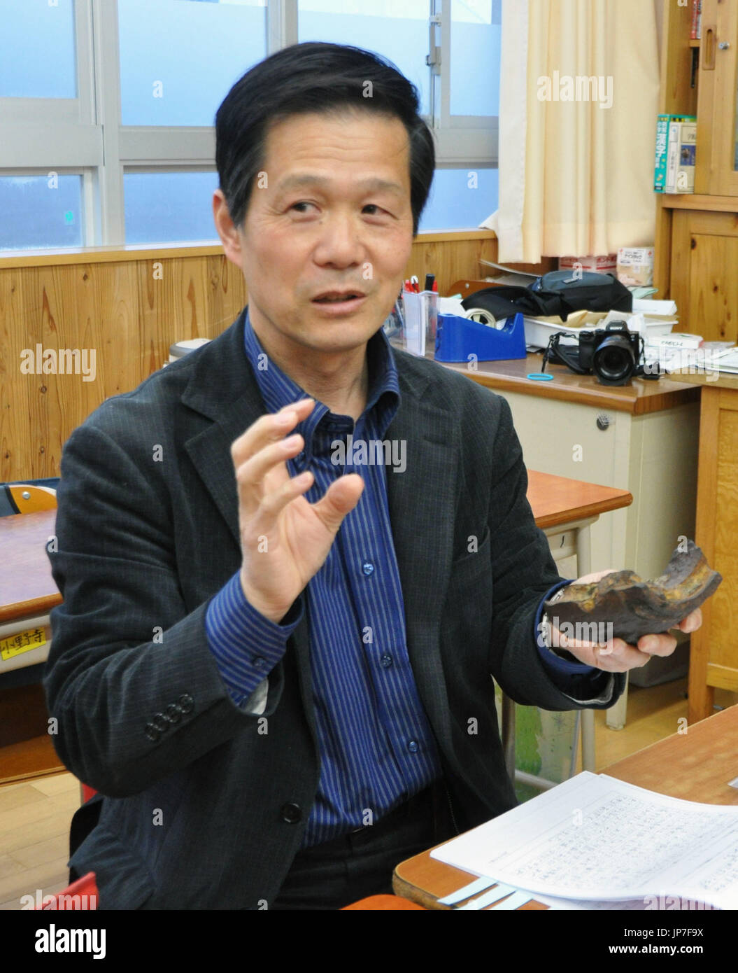 Elementary schoolteacher Sadamitsu Ushijima talks in Tokyo on March 7 ...