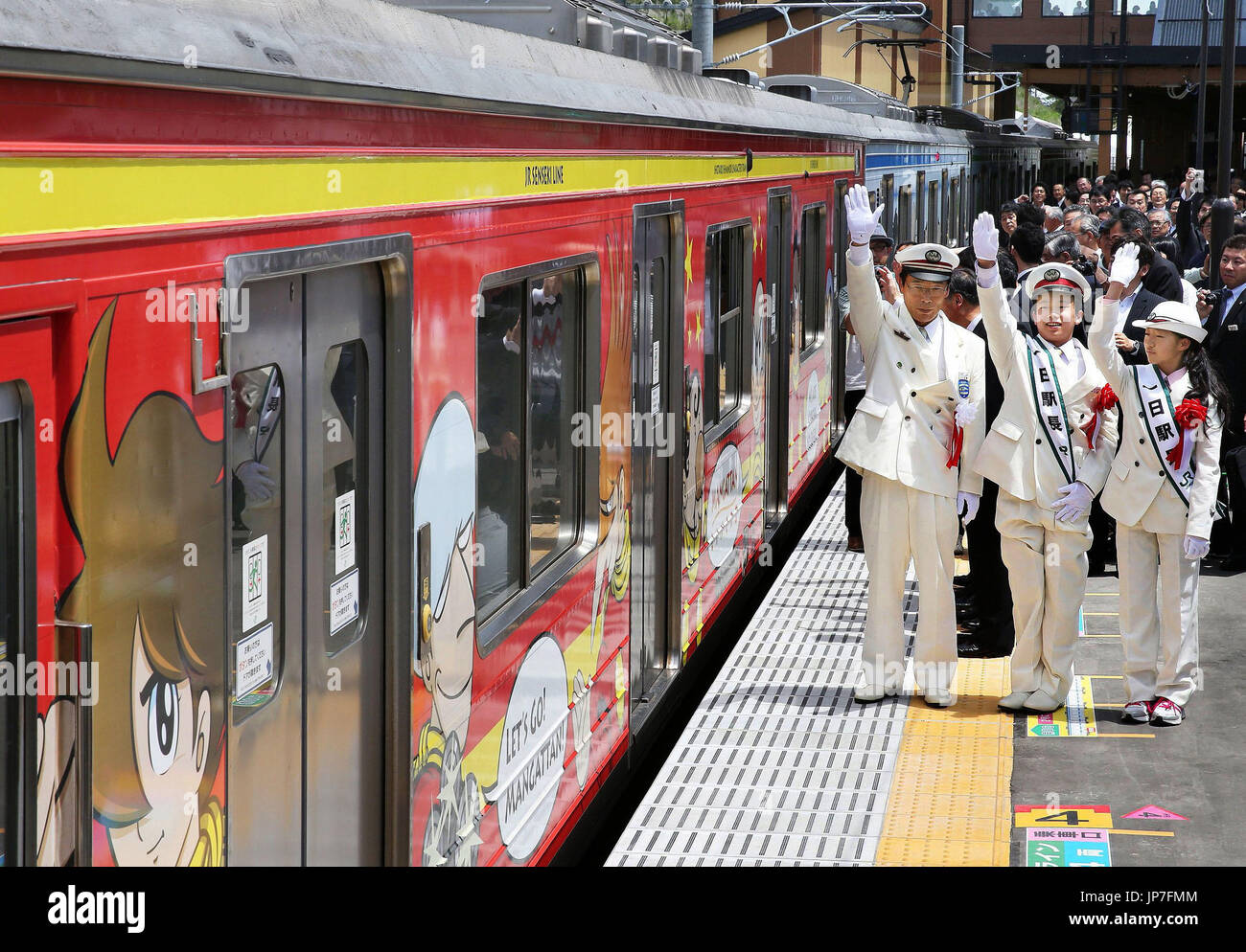 Participants in a ceremony celebrating the resumption of full train ...