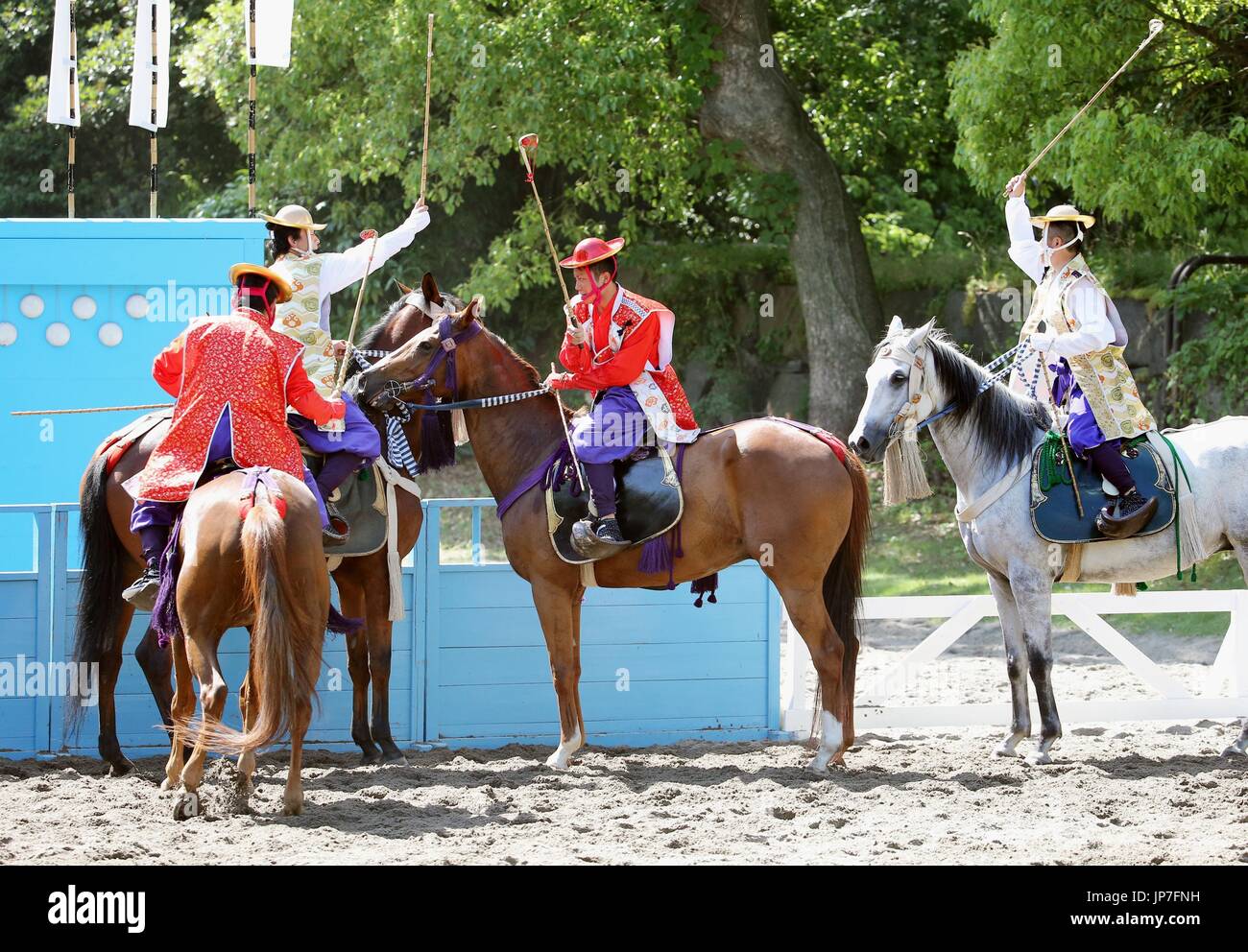Horsemen perform a game of "dakyu," or ancient Japanese polo, during a ...