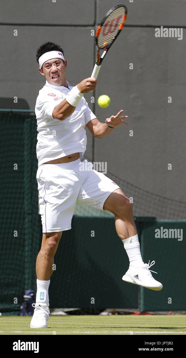 Photo shows Japan's Kei Nishikori competing with Simone Bolelli of ...
