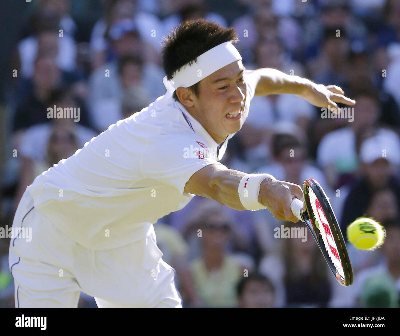 Photo shows Japan's Kei Nishikori competing with Simone Bolelli of ...