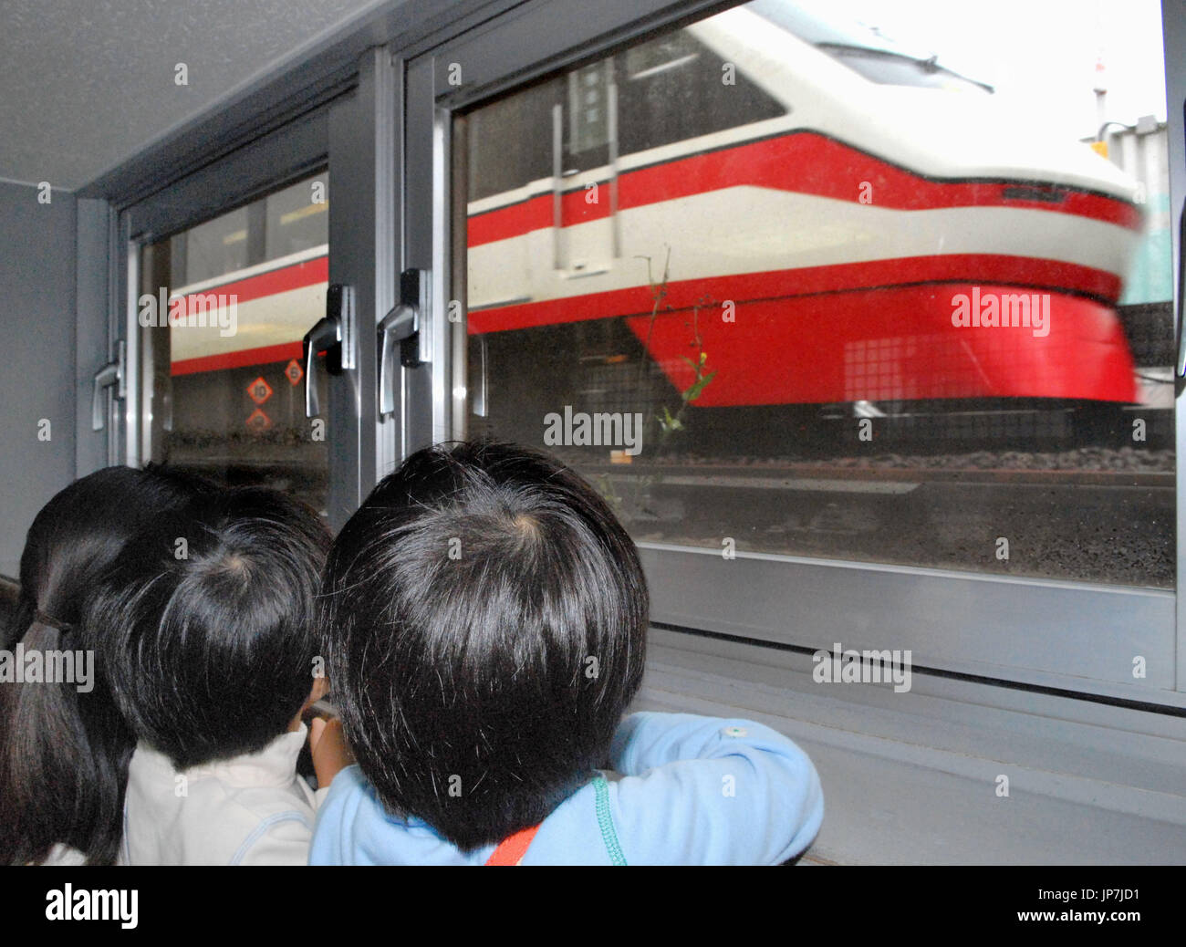 Children enjoy watching train wheels from the Tobu Museum in Tokyo's ...