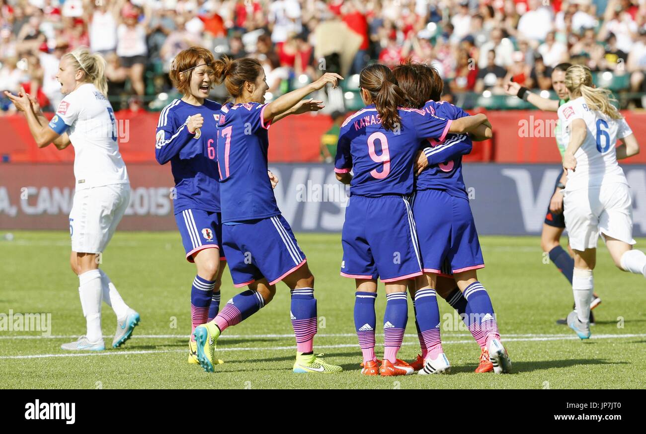 Japanese players celebrate after midfielder Aya Miyama scored the ...