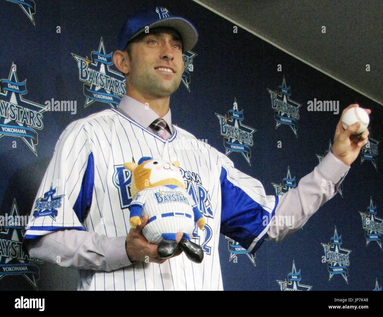 Newly acquired DeNA BayStars left-handed pitcher Duane Below poses for ...