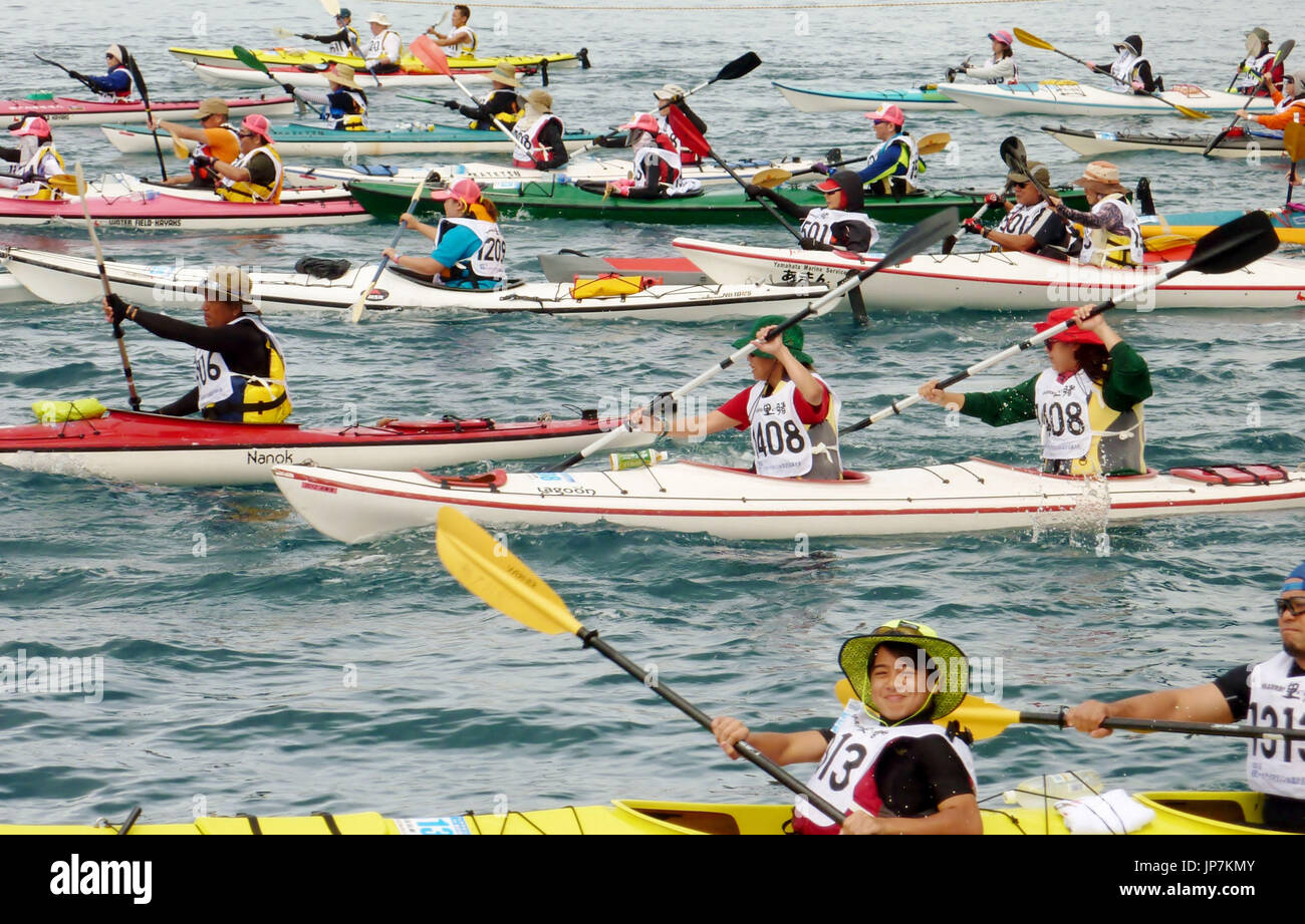 A sea kayaking race, one of the largest of its kind in Japan, is held ...
