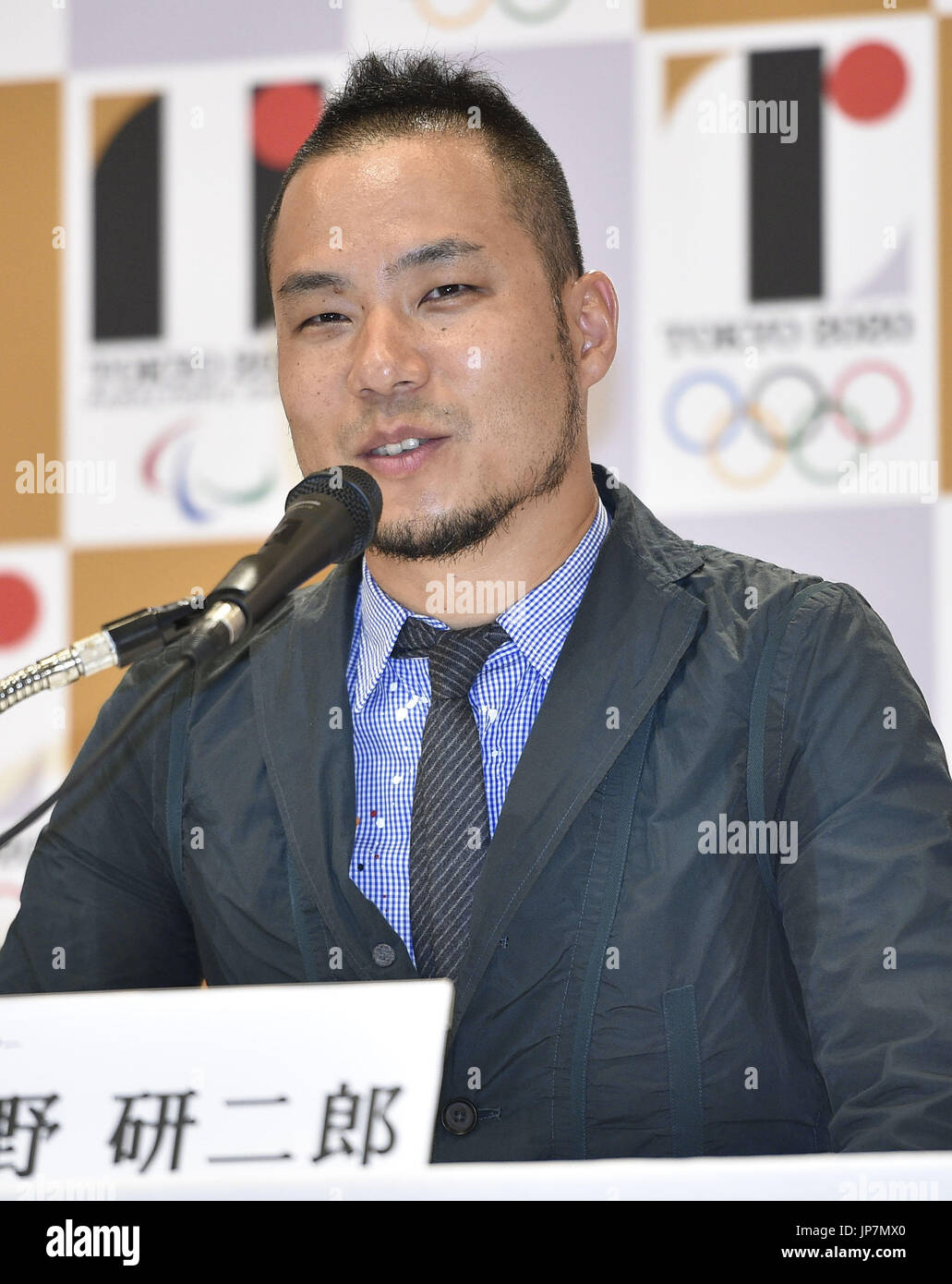 Japanese art director Kenjiro Sano speaks at a press conference in ...
