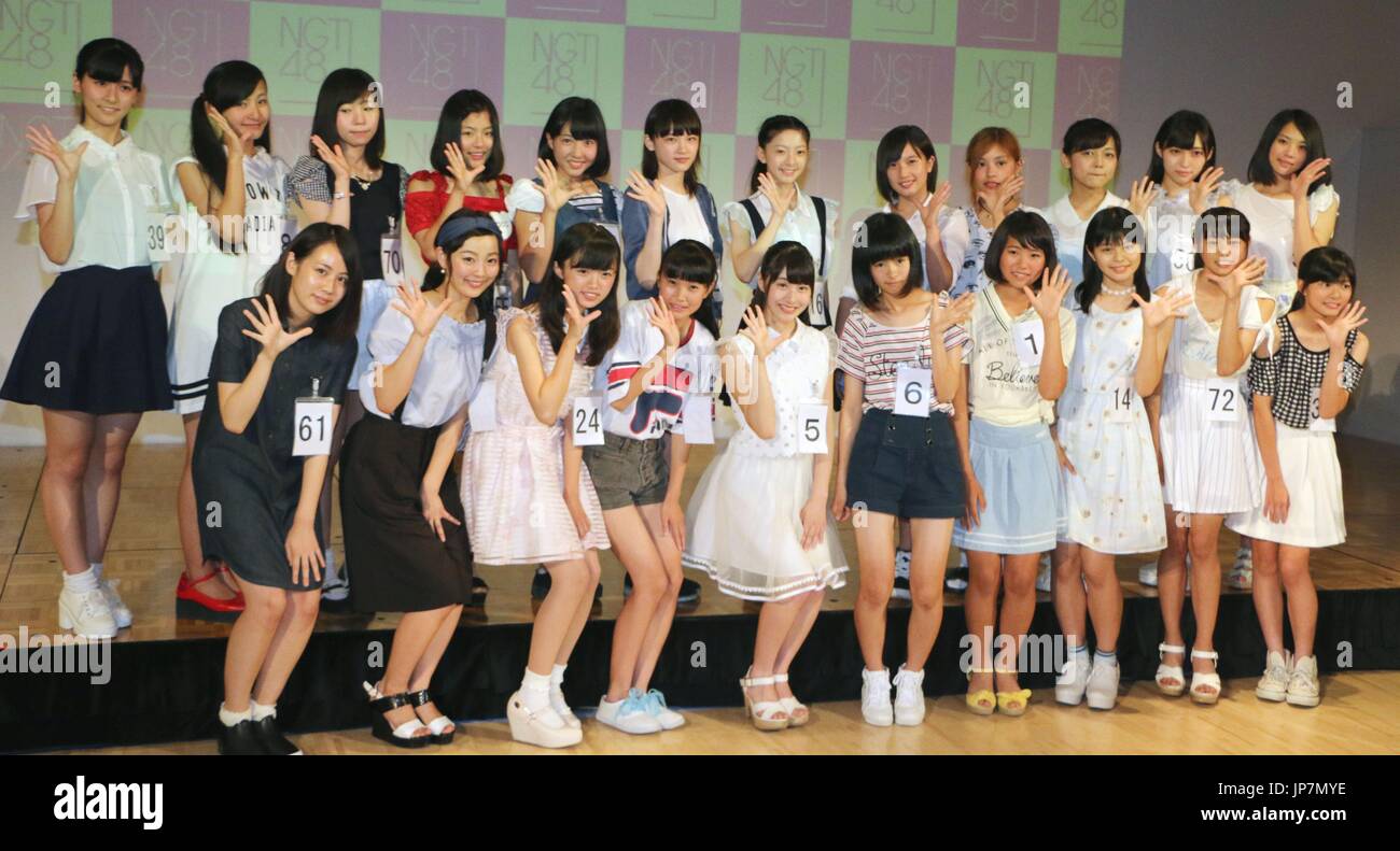 Twenty-two girls aged 12 to 20 pose for a photo after being selected in the final audition to ...
