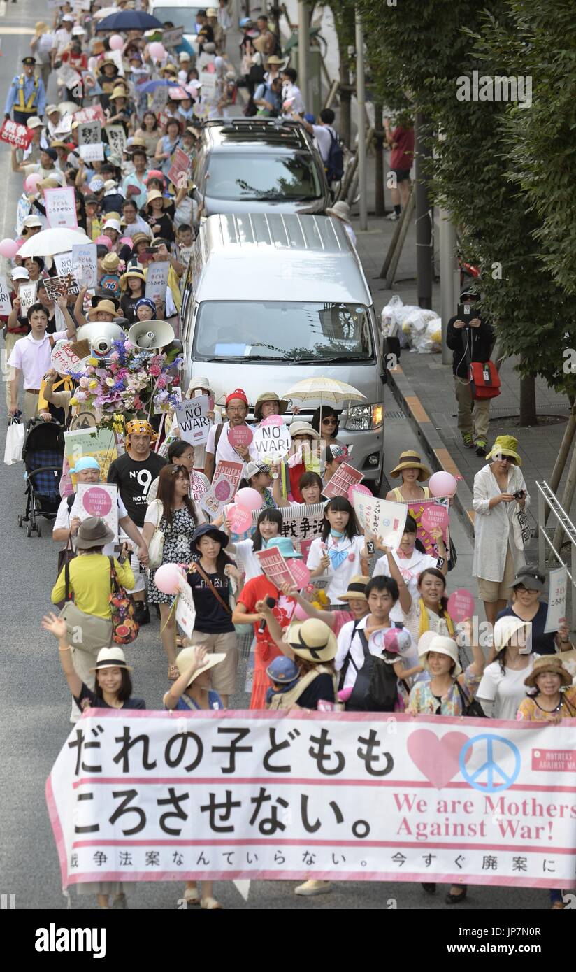 Around 1,500 mothers and their children march in Tokyo's Shibuya ...