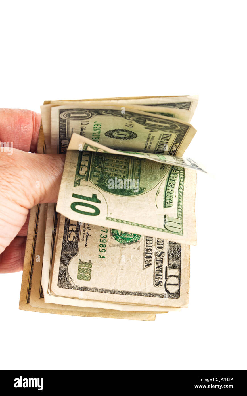 Hand holding small amount of American money Stock Photo - Alamy