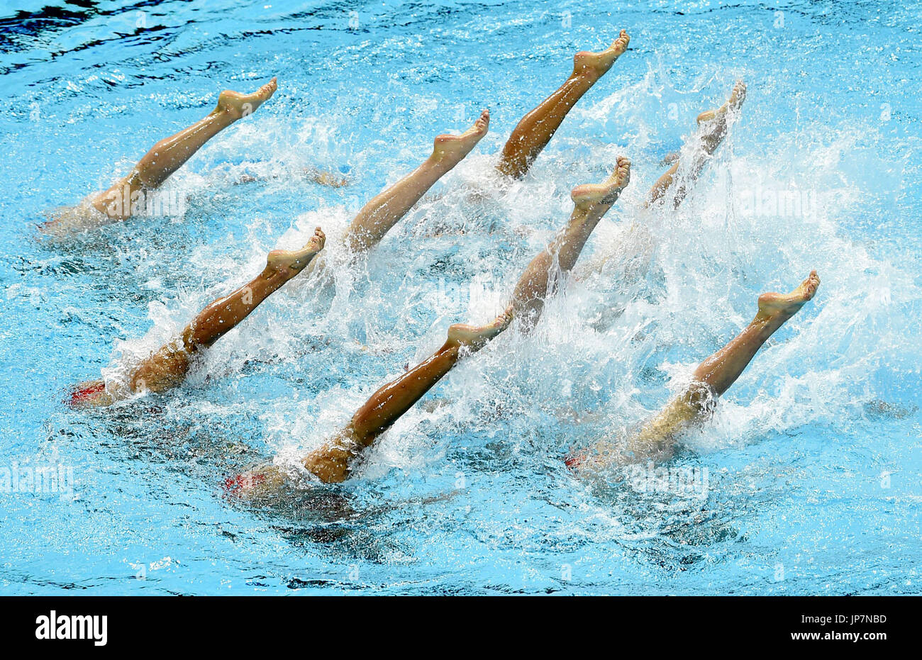 Japanese synchronized swimmers perform during the team technical ...