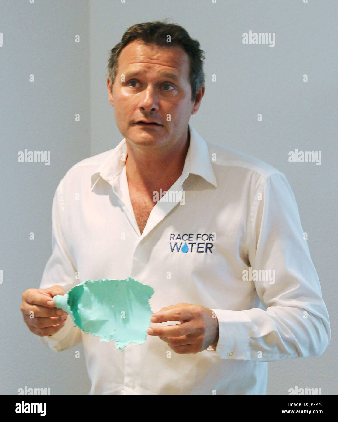 Marco Simeoni, head of the Swiss-based Race for Water Foundation, shows ...