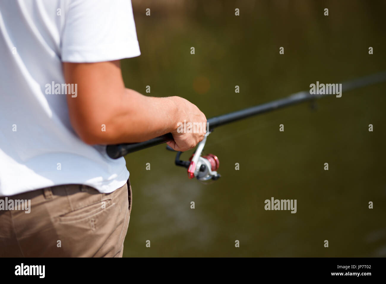 Man fisherman fishing rod hi-res stock photography and images - Alamy