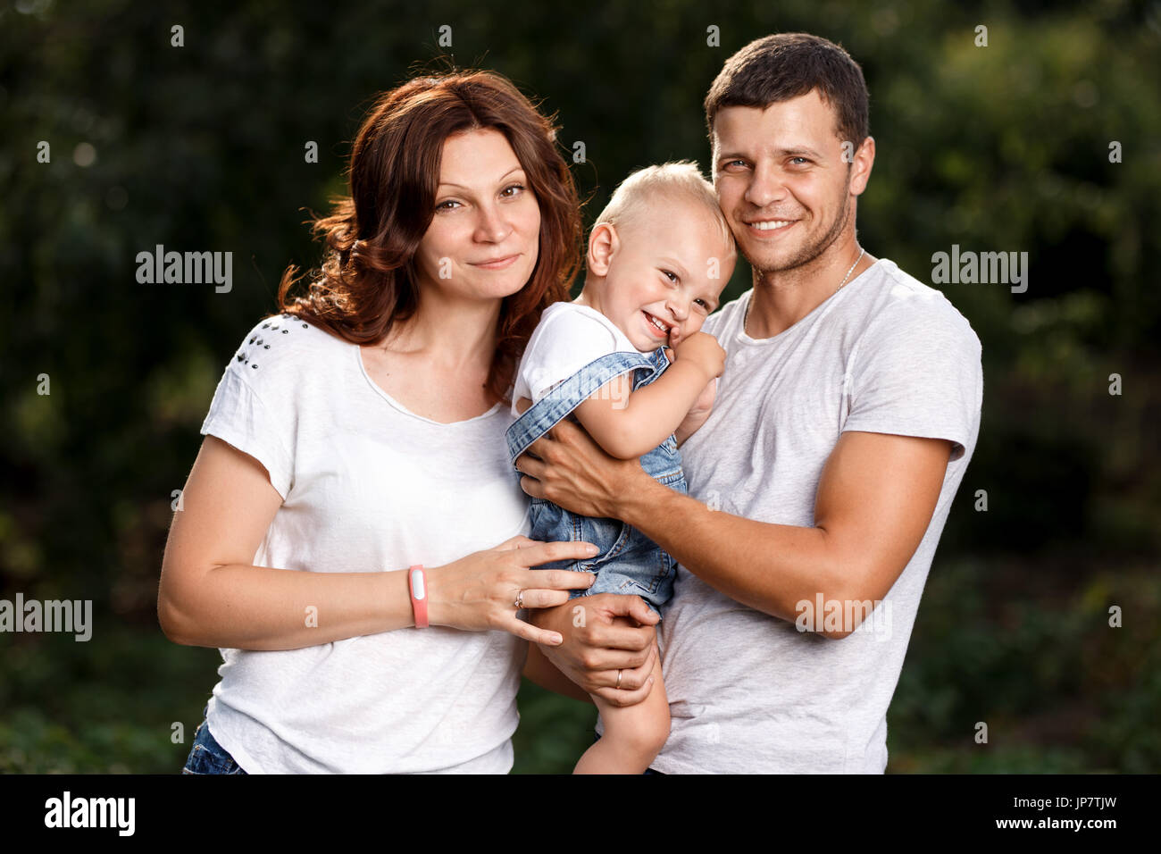 Happy cheerful family with children outdoors Stock Photo - Alamy