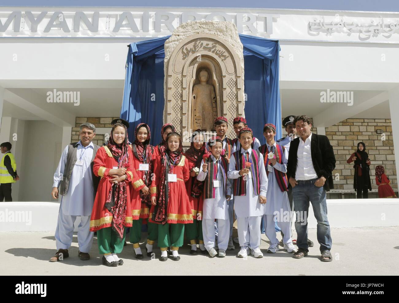 Citizens in Bamiyan, central Afghanistan, pose in front of a statue on ...