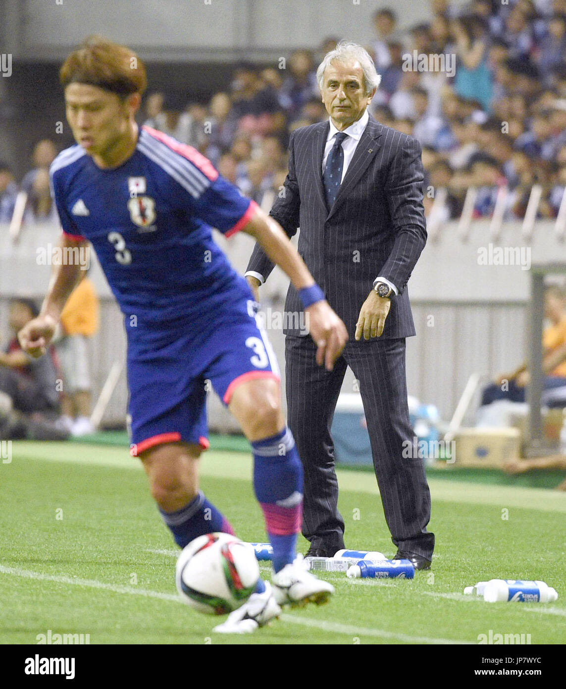 Japan head coach Vahid Halilhodzic watches Kosuke Ota of Japan during ...