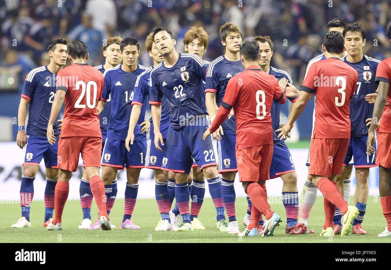 Singapore players Khairul Nizam (20), Hafiz Abu Sujad (8) and Shaiful ...