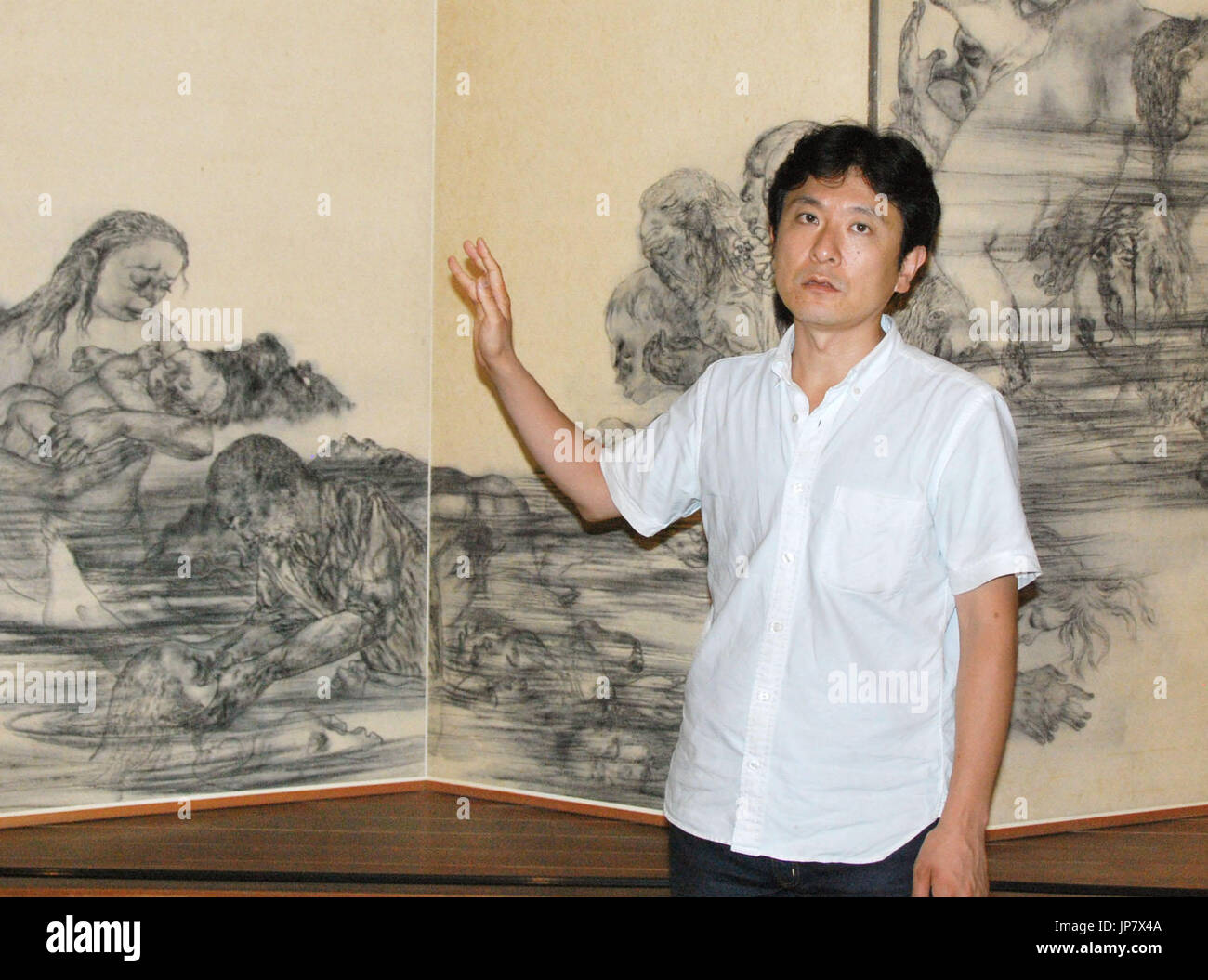 Yukinori Okamura, a curator at the Maruki Gallery for the Hiroshima ...
