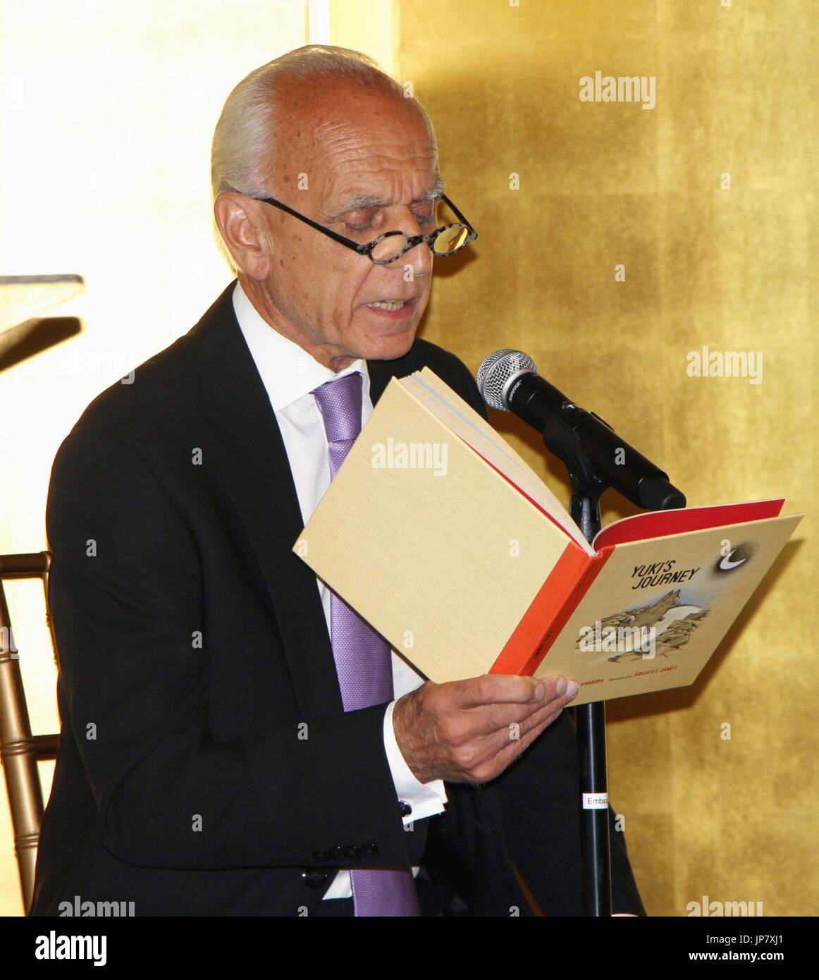 Joseph Krakora, a senior adviser at the National Gallery of Art, reads ...