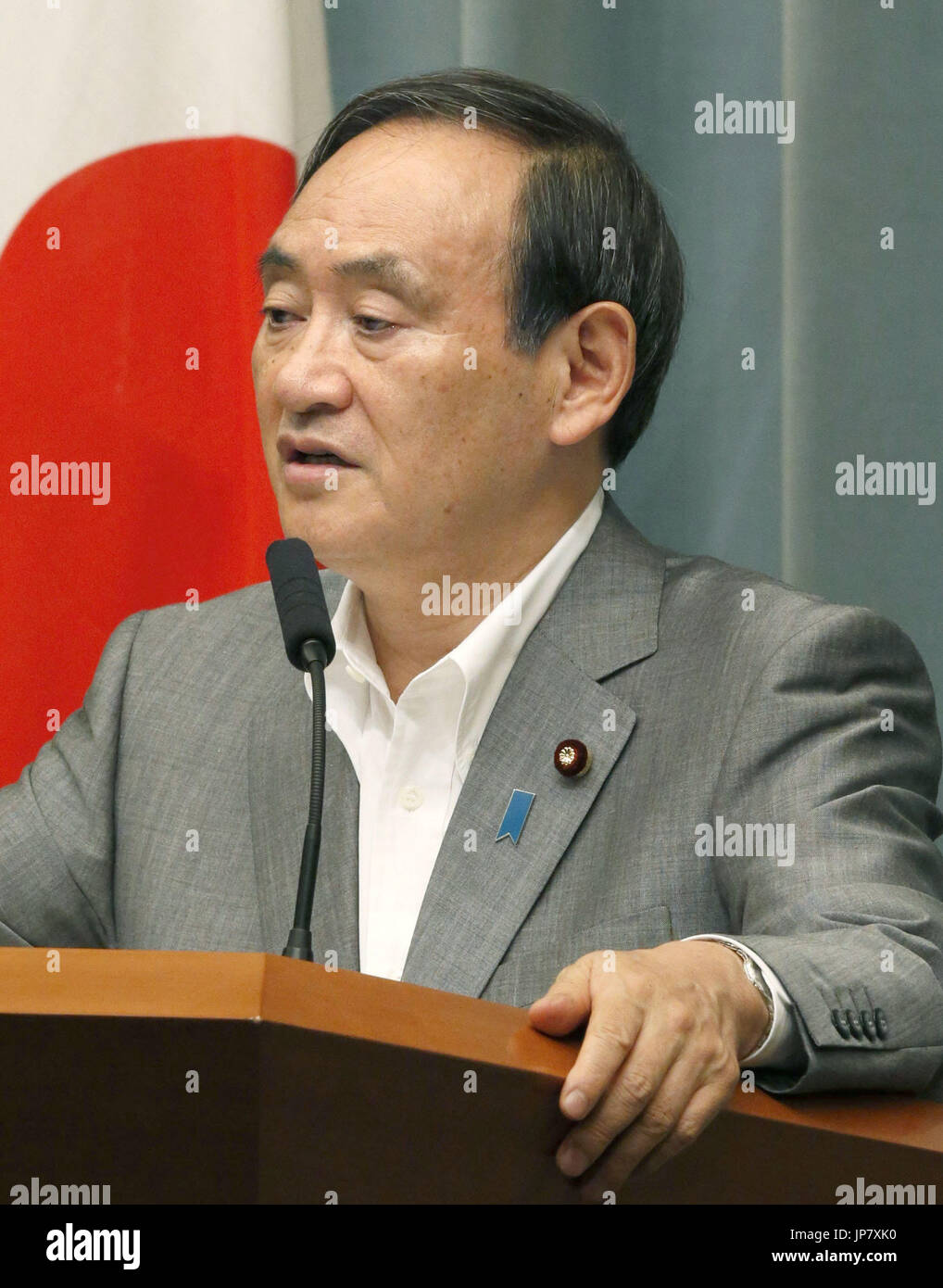 Chief Cabinet Secretary Yoshihide Suga announces at a press conference ...