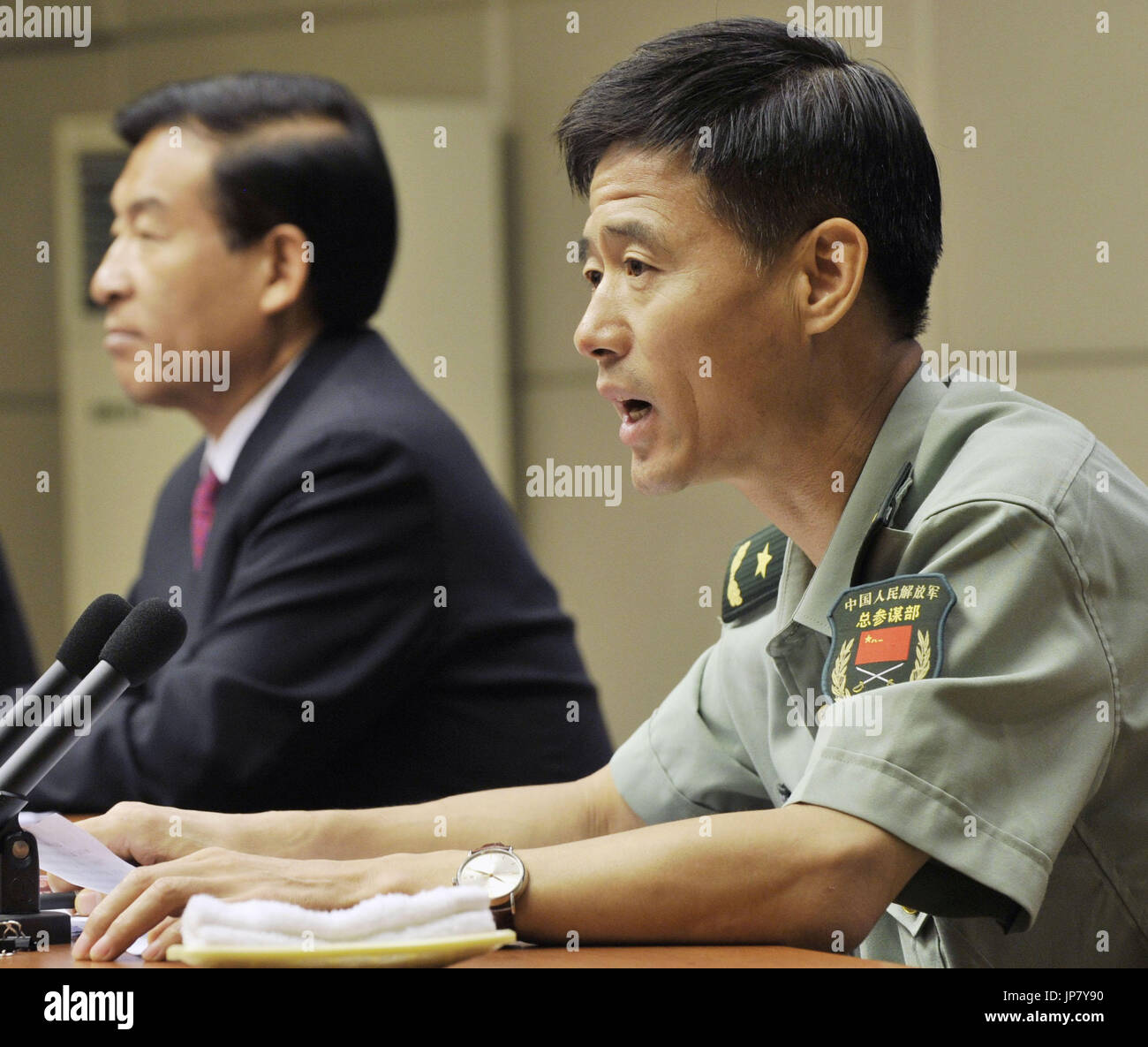 Qu Rui (R), deputy director of the Parade Steering Group Office under ...