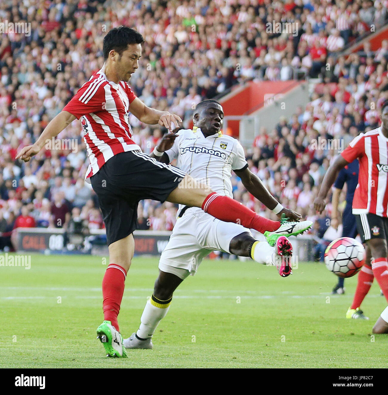 Japanese defender Maya Yoshida (L) of English Premier League club ...
