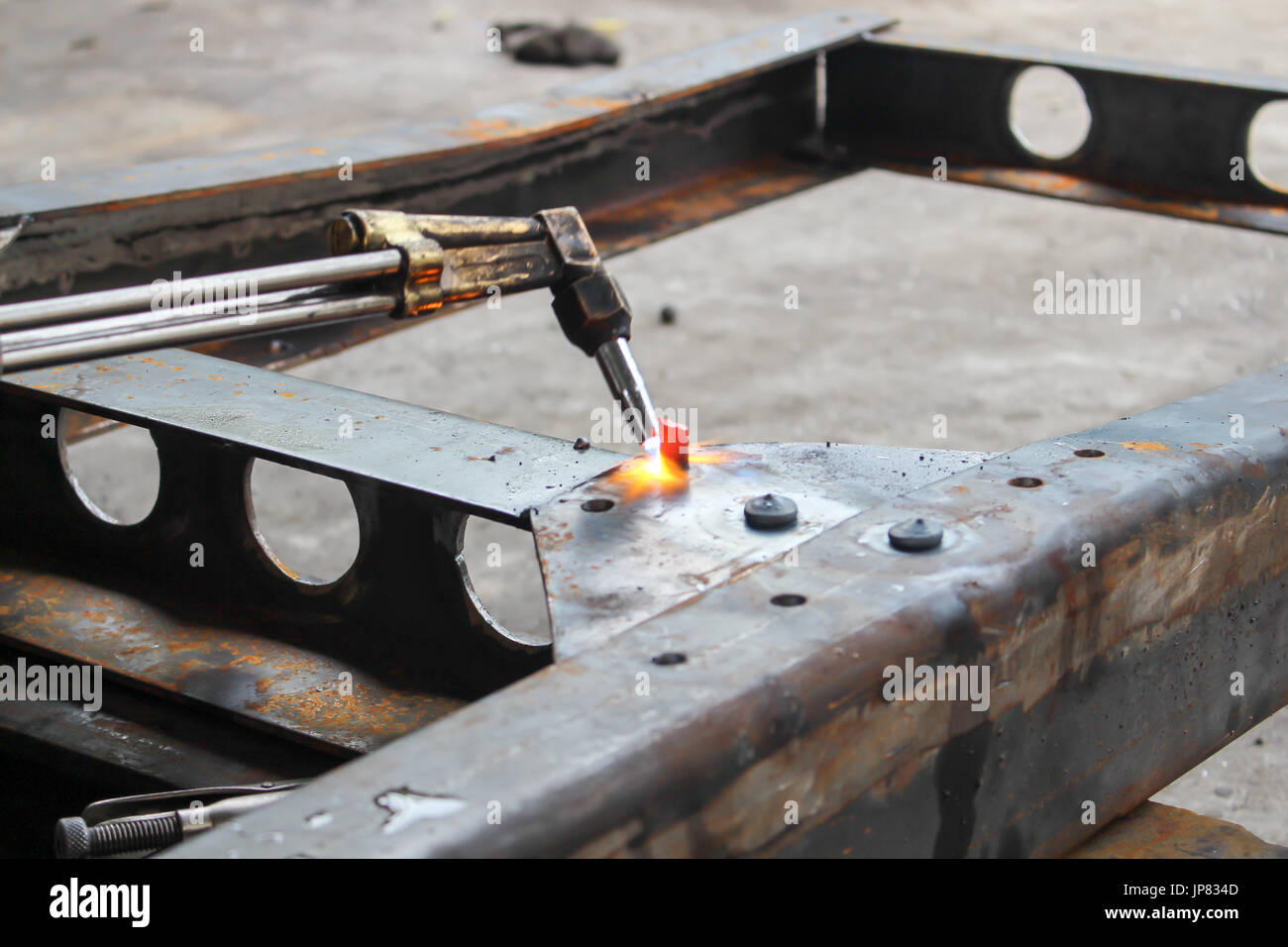worker cutting steel with fire gas Stock Photo - Alamy