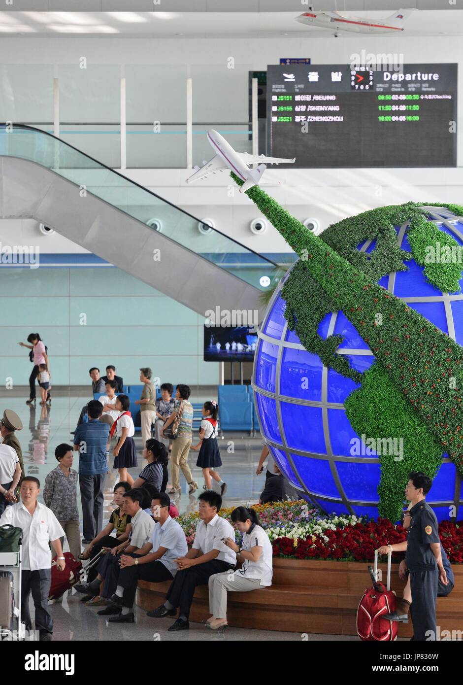 North Korean citizens visit a newly completed terminal building at ...