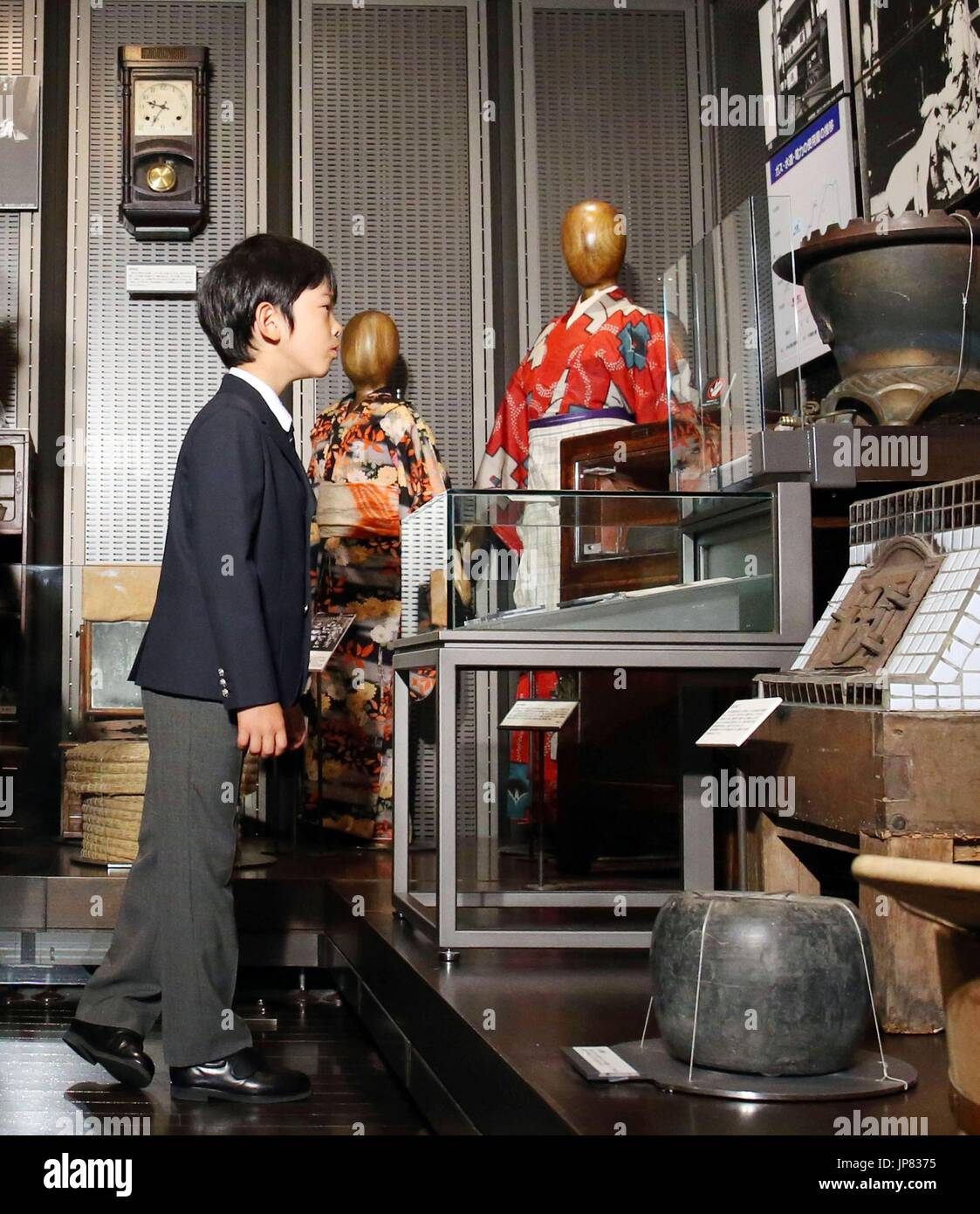 Prince Hisahito, the son of Prince Akishino and Princess Kiko, looks at ...