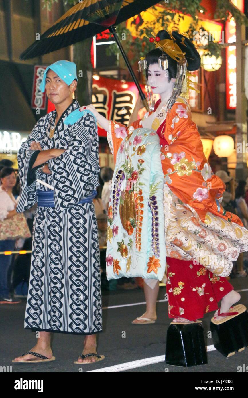 A popular "oiran" (courtesan) parade is performed during the Susukino ...