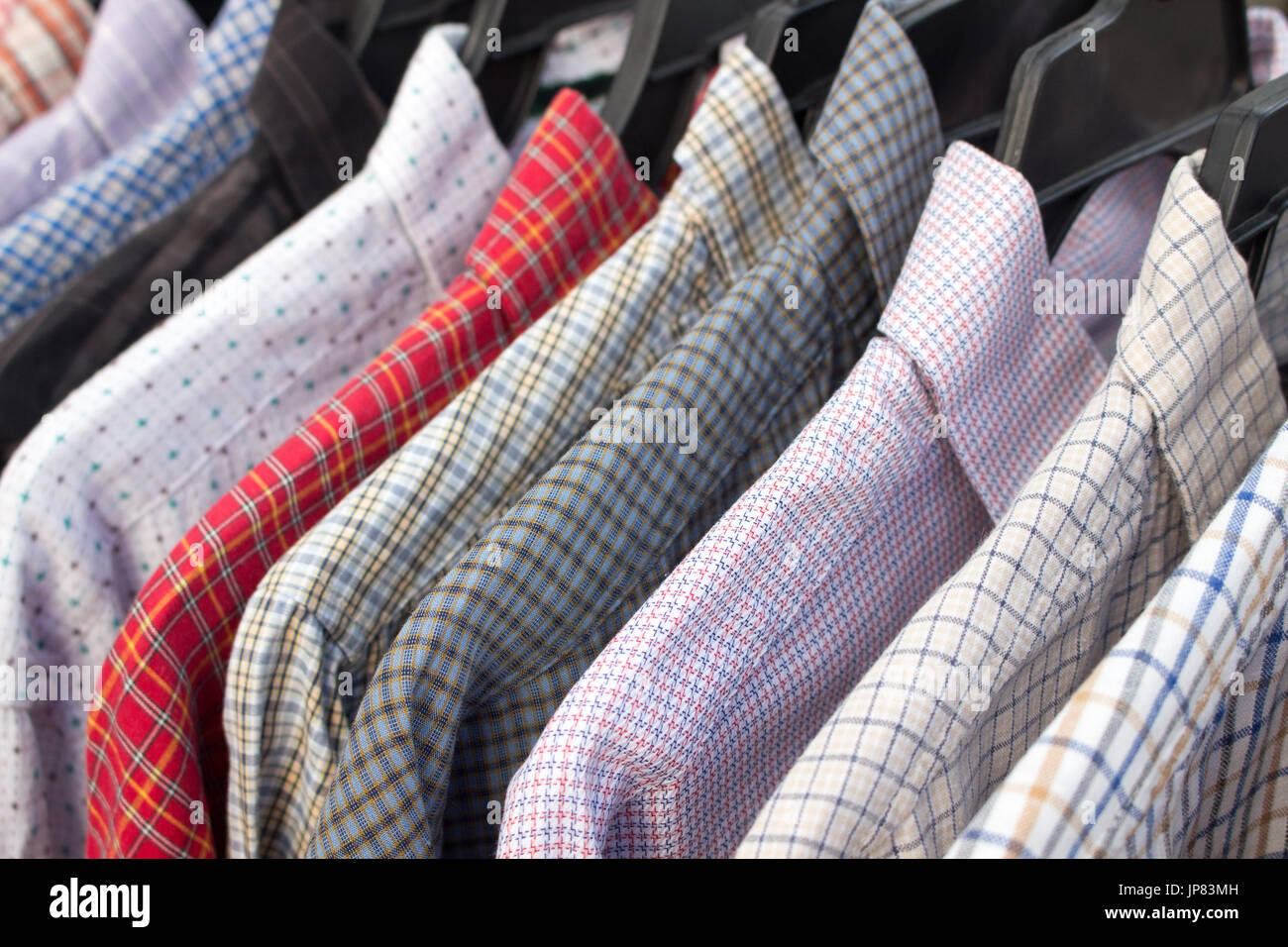 clothes hanger background Stock Photo - Alamy