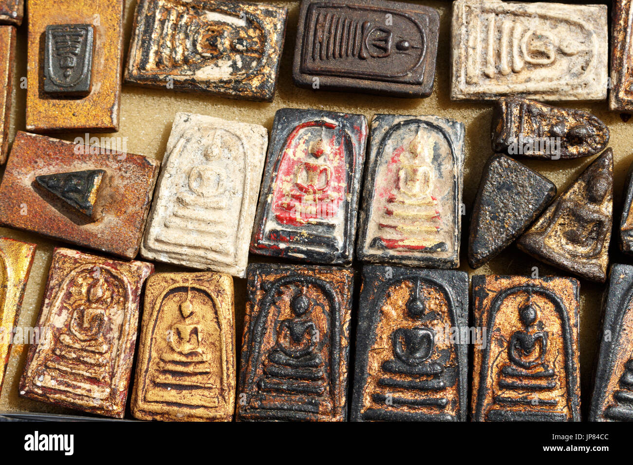 Sacred buddhist clay objects Stock Photo - Alamy