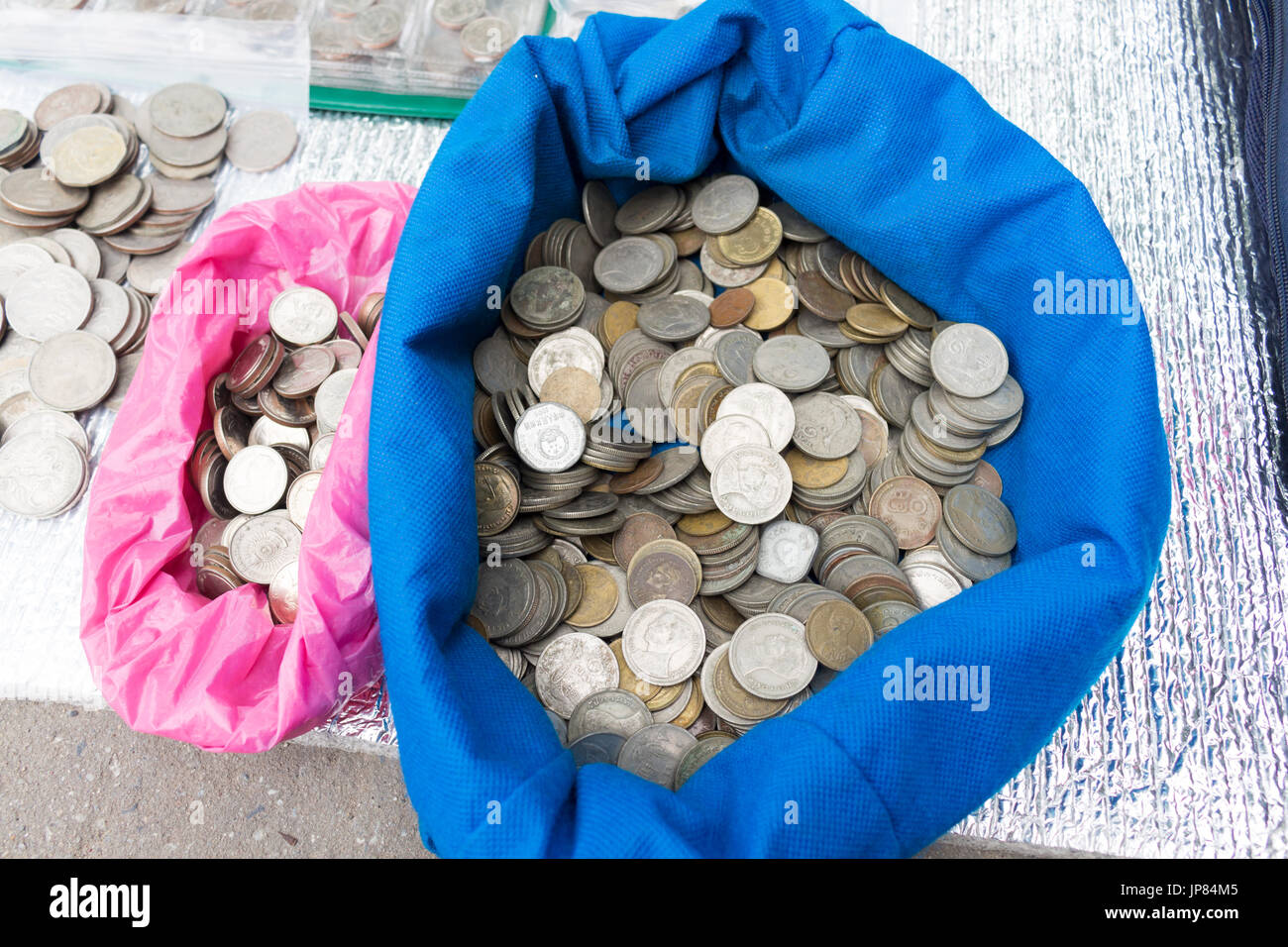 Money coil hi-res stock photography and images - Alamy