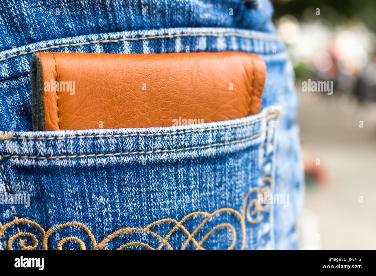 wallet in cloth jeans pocket Stock Photo - Alamy
