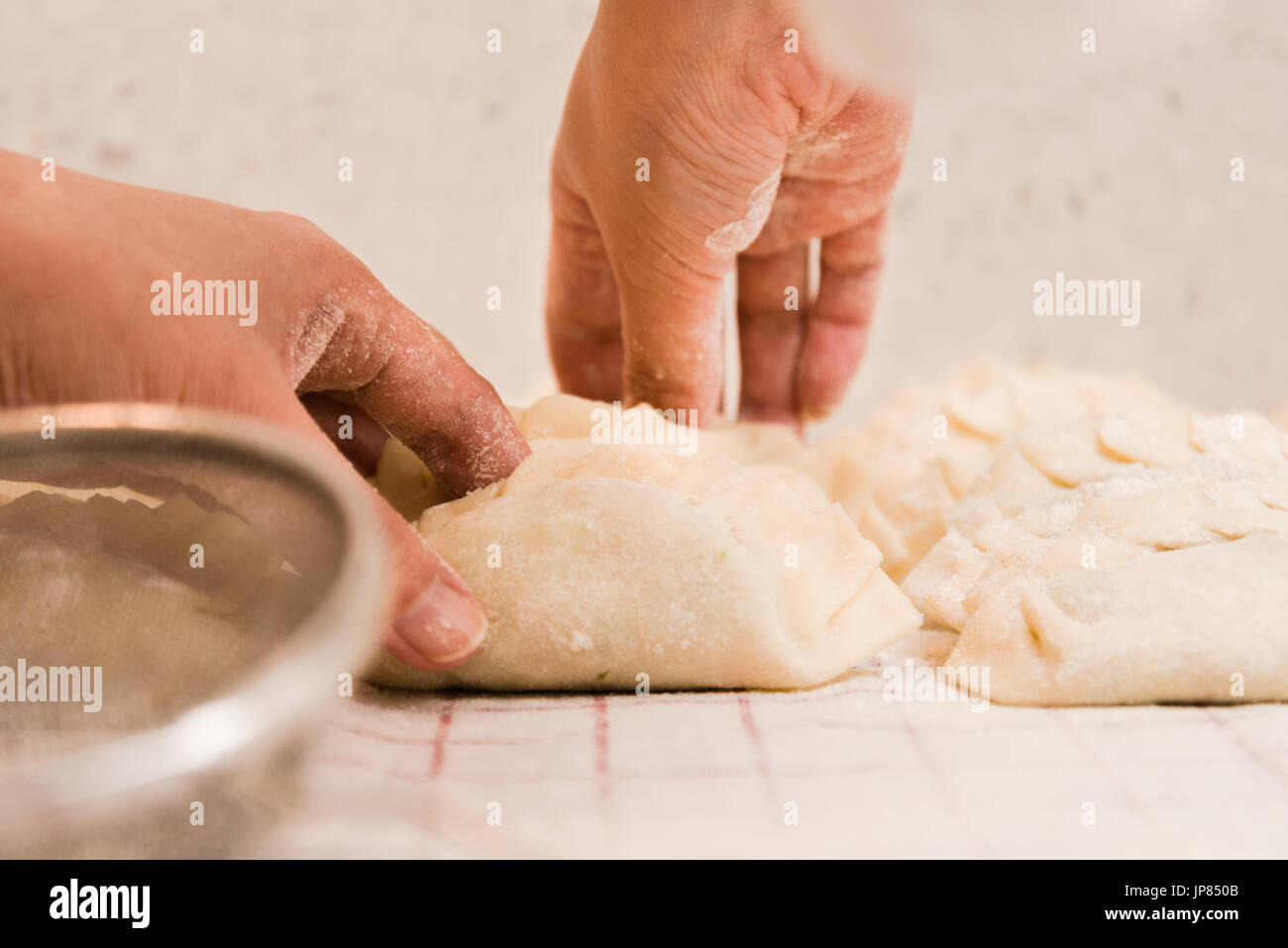 Preparing the Meal; Homemade Dumpling for Lunch Stock Photo - Alamy