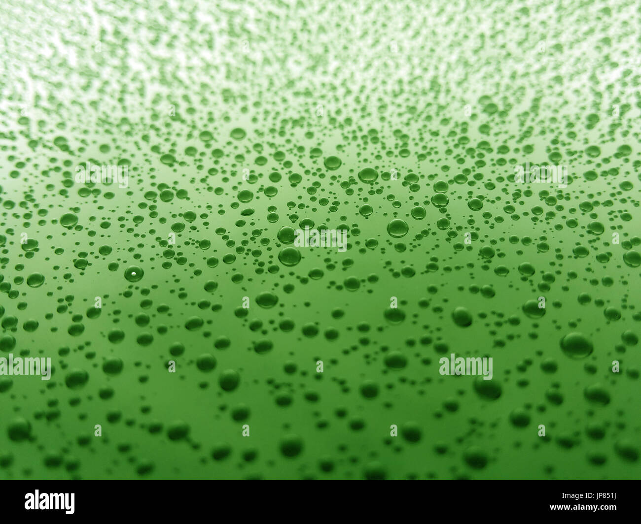 Green Drop water background Stock Photo - Alamy