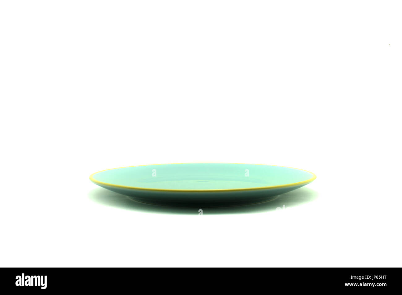 green plate on isolated Stock Photo - Alamy