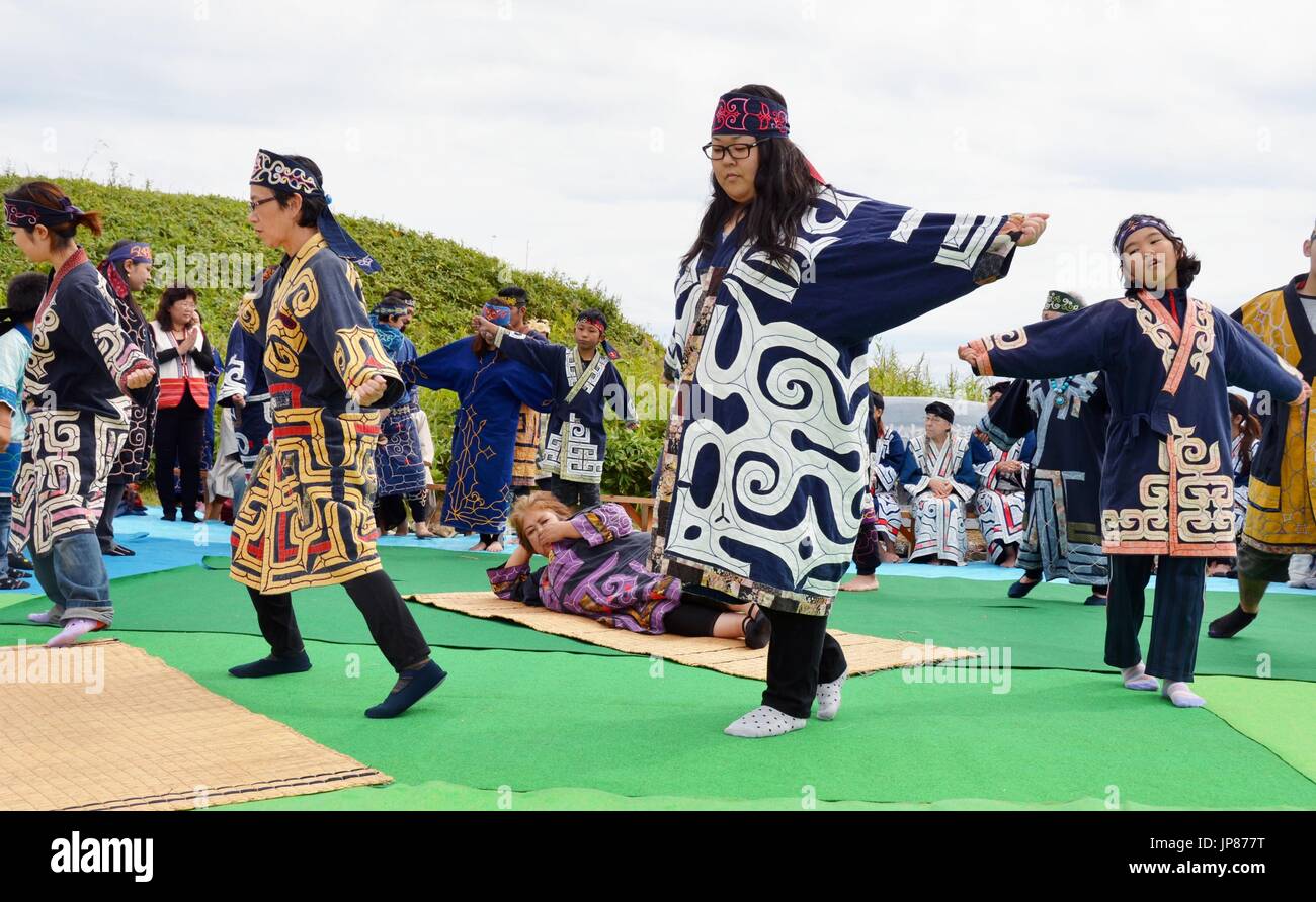 Ainu perform a ritual dance to thank whales on Sept. 6, 2015, in ...