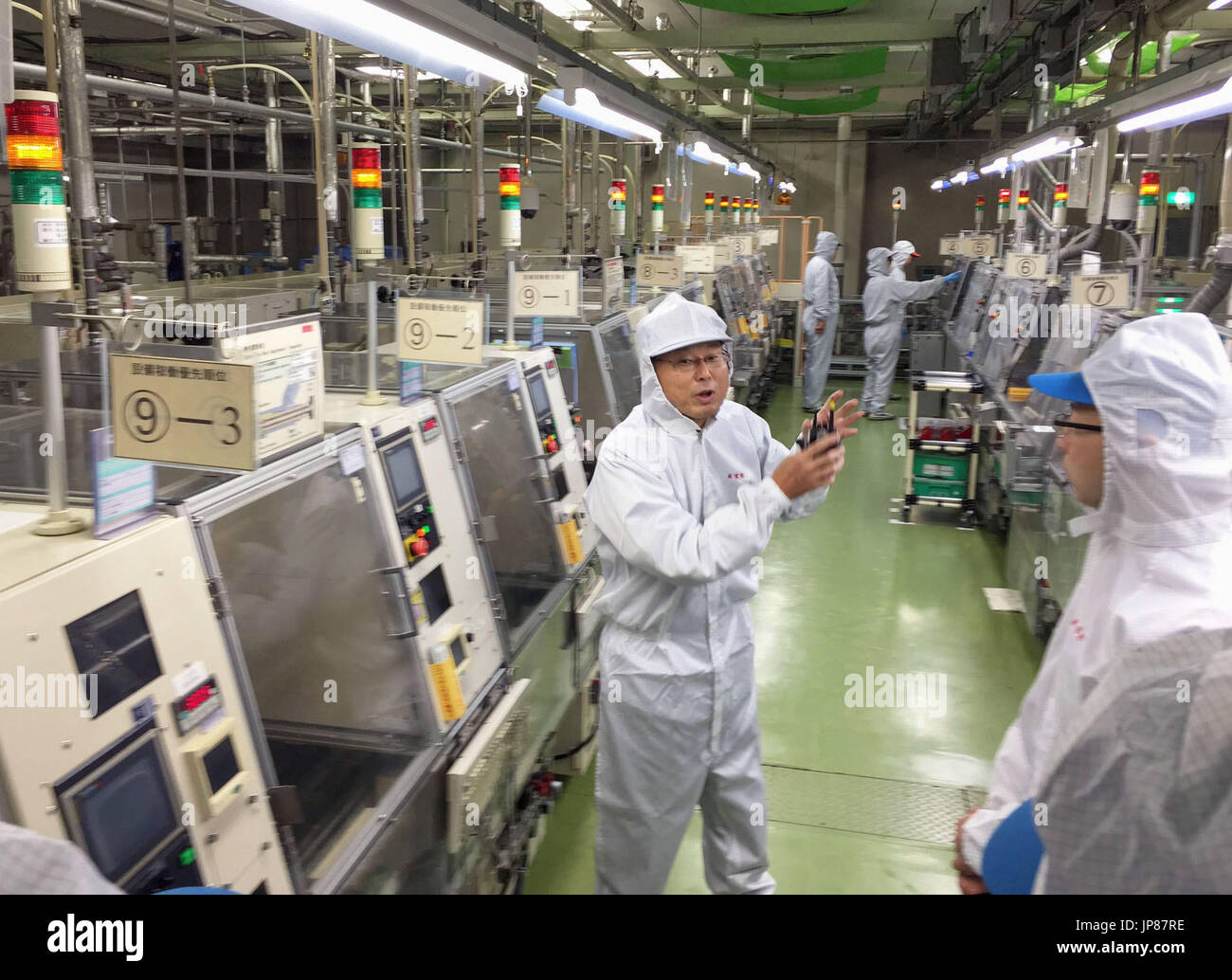 Denso Corp. allows media access to a production line for auto fuel ...