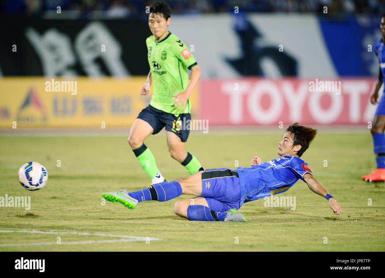 Gamba Osaka defender Koki Yonekura (foreground) scores with a left-foot ...