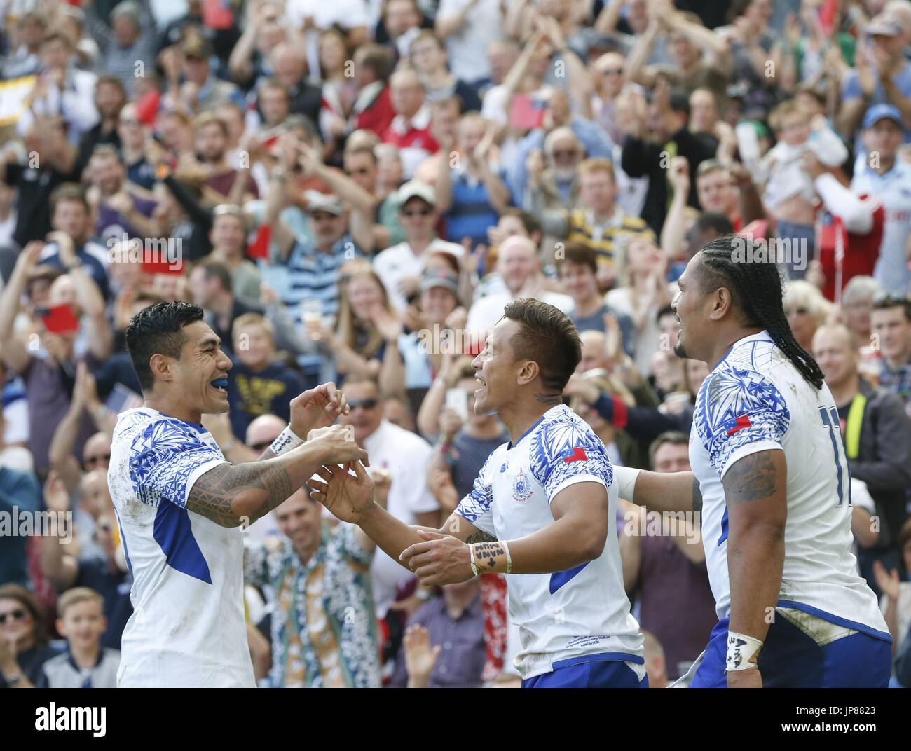 Tim Nanai-Williams (C) of Samoa celebrates with his teammates after ...