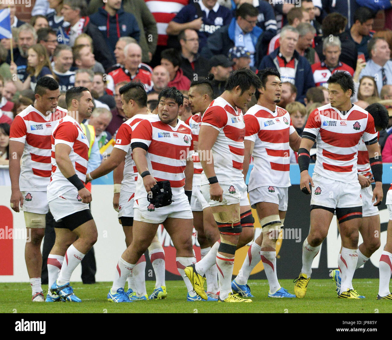Members of Japan's national rugby team leave the ground following their ...