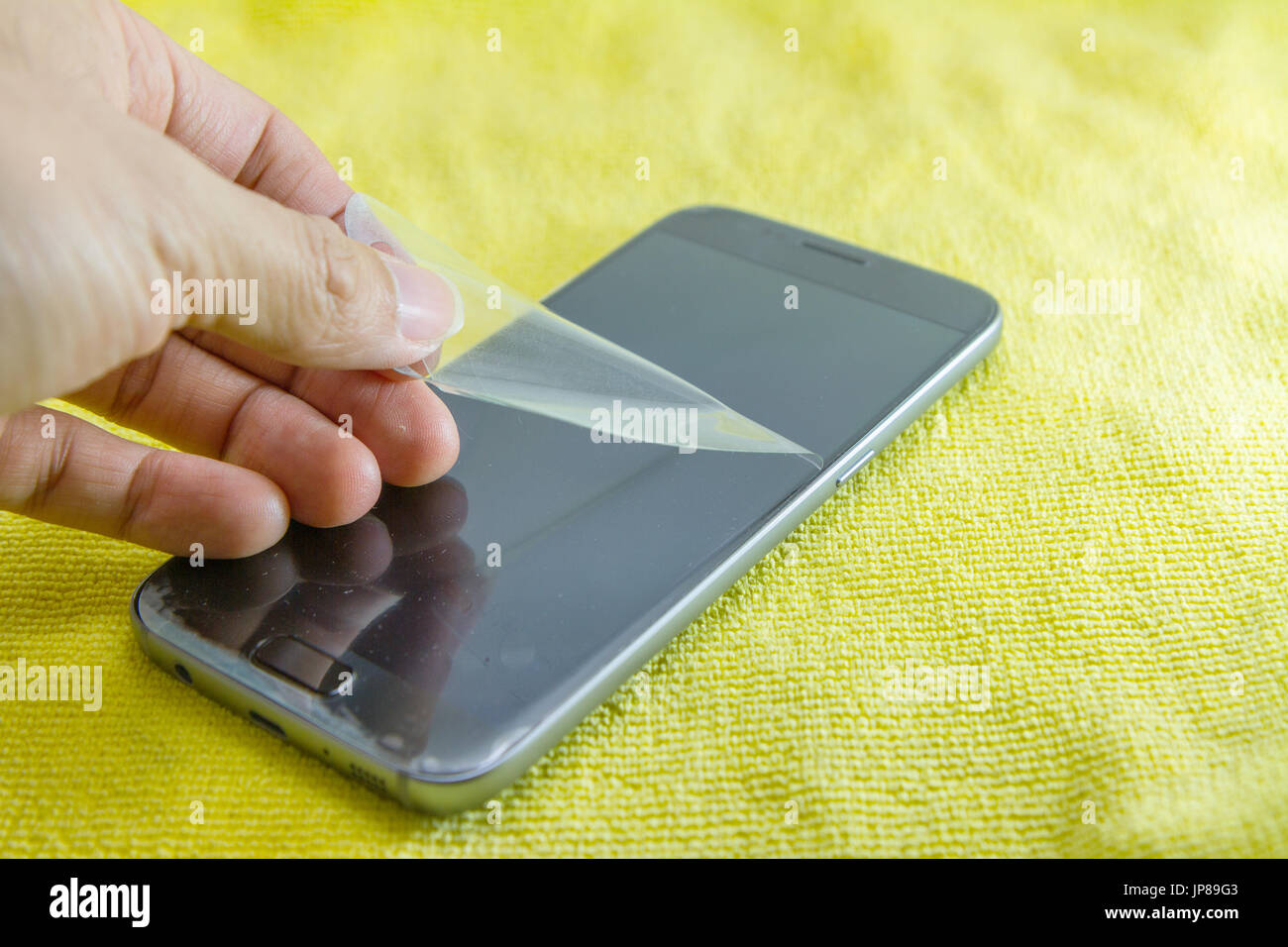 remove the smart phone screen protect Stock Photo - Alamy