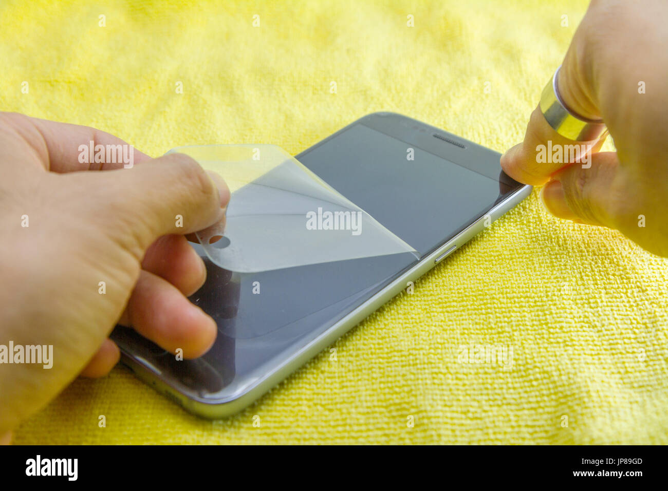 remove the smart phone screen protect Stock Photo - Alamy