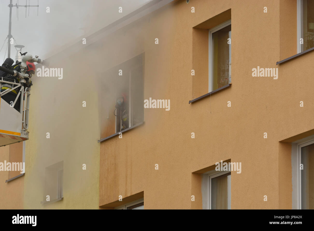 Fire in the apartment block Stock Photo - Alamy