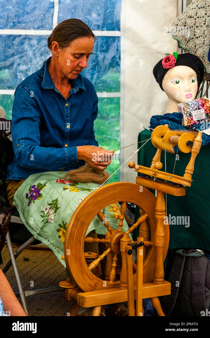 A Woman Using A Spinning Wheel, Fulking, Sussex, UK Stock Photo - Alamy